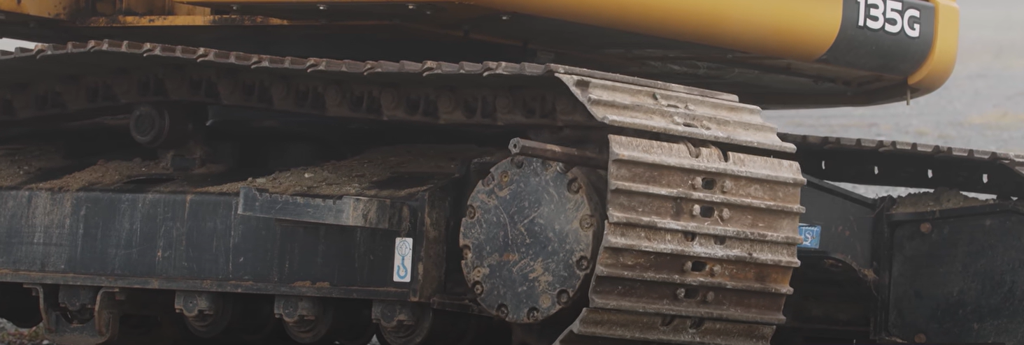 How do bottom rollers enhance the performance of piling rigs?